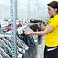 Picking of hanging garments with RFID scanner | SSI SCHAEFER
